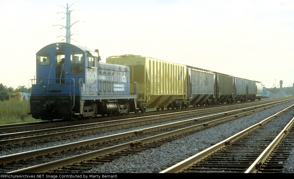 CR 9047 With Some Covered Hoppers at About Western Ave.